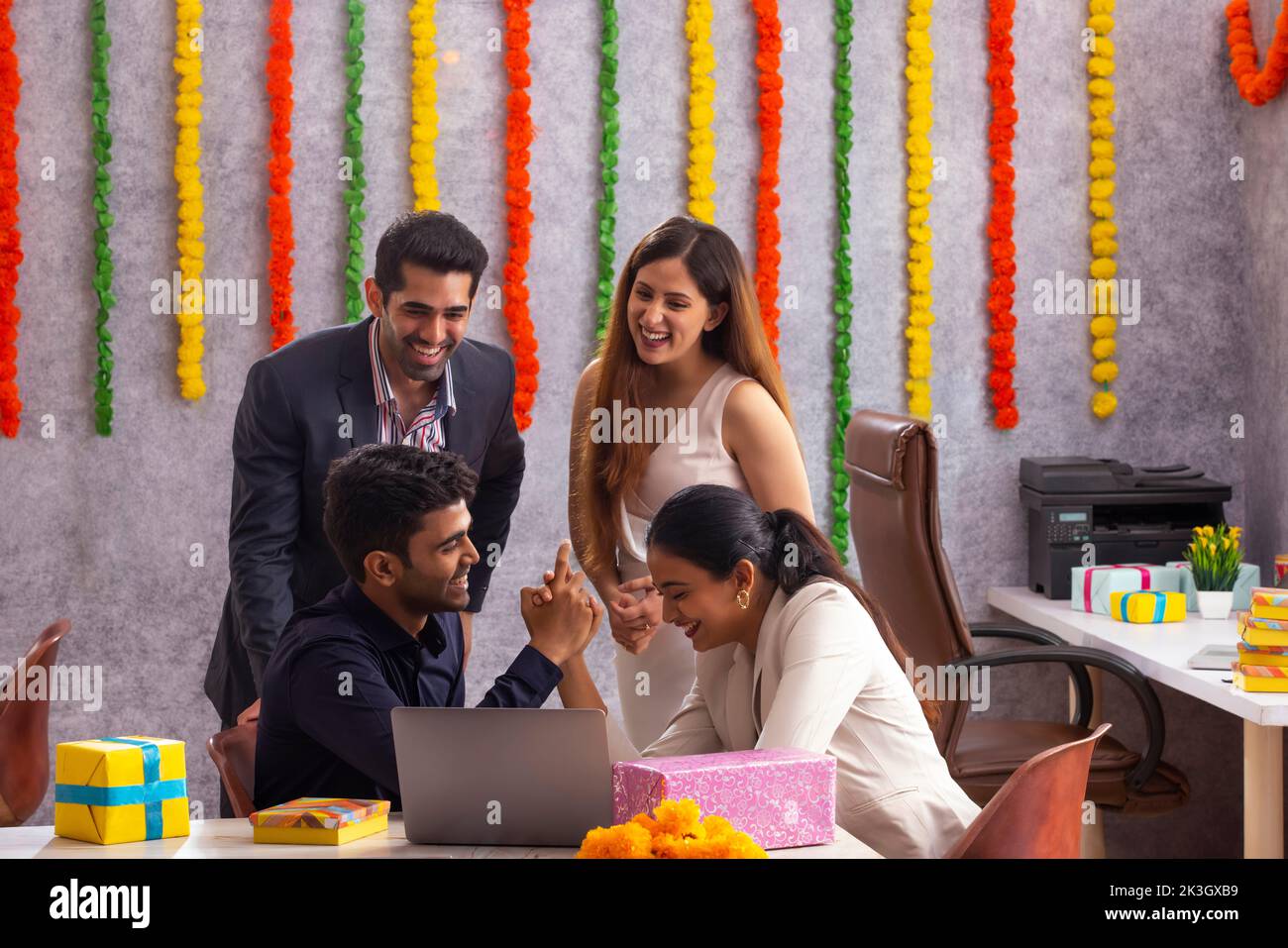 Employee celebrating Diwali together in office Stock Photo - Alamy