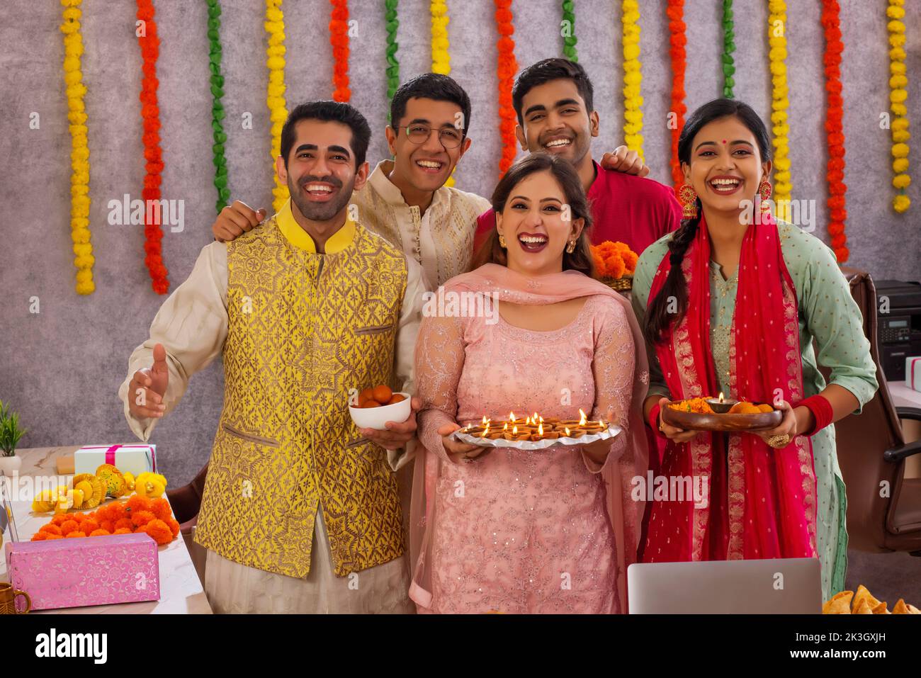 Office colleagues celebrating Diwali together in office Stock Photo - Alamy