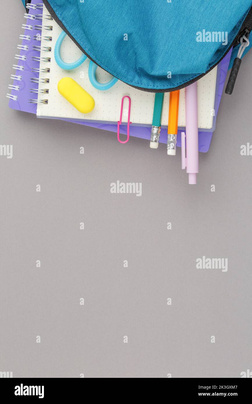 School backpack with educational supplies Stock Photo - Alamy