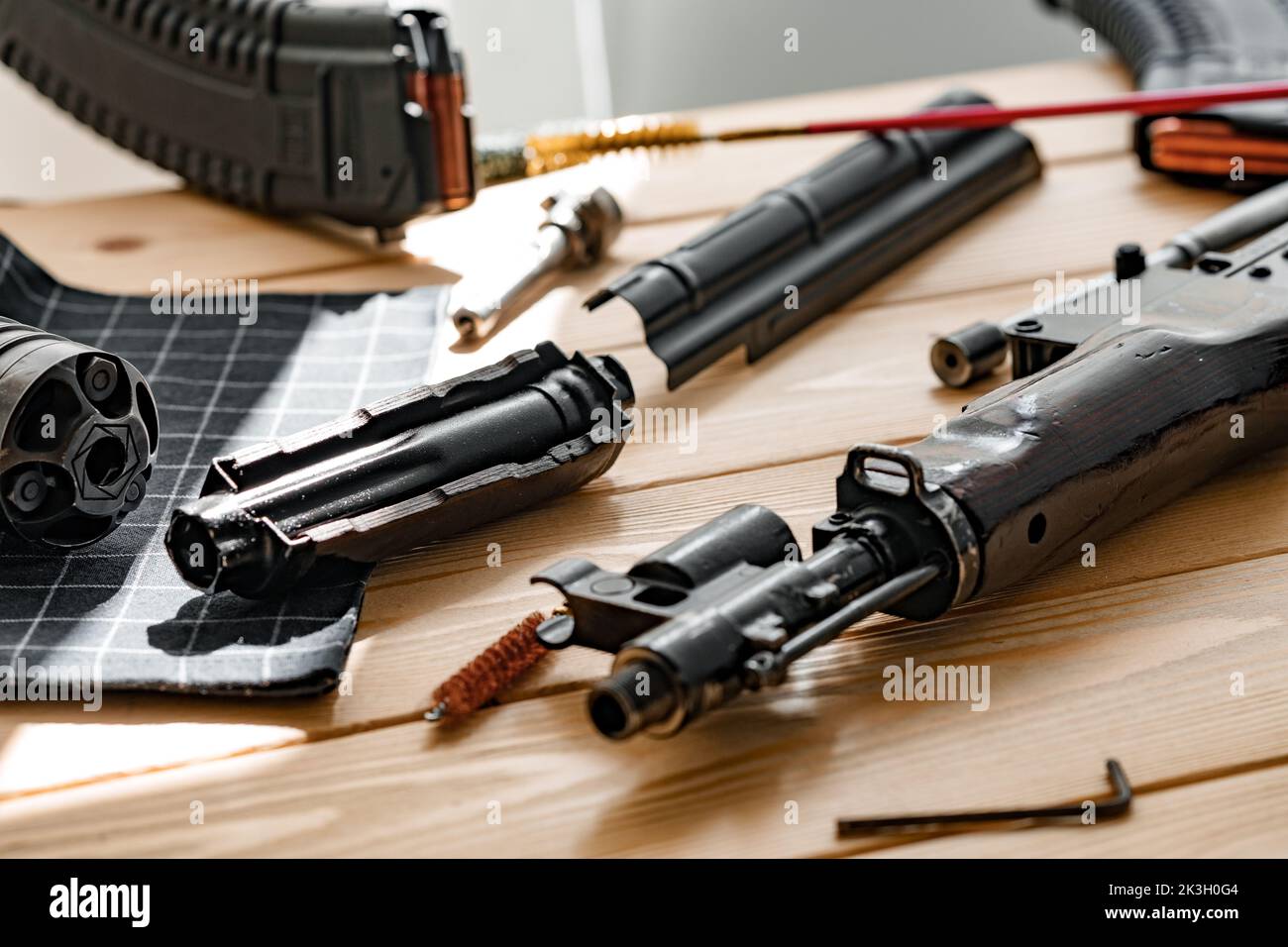 Gunsmith's working table for gun cleaning and maintaining Stock Photo ...