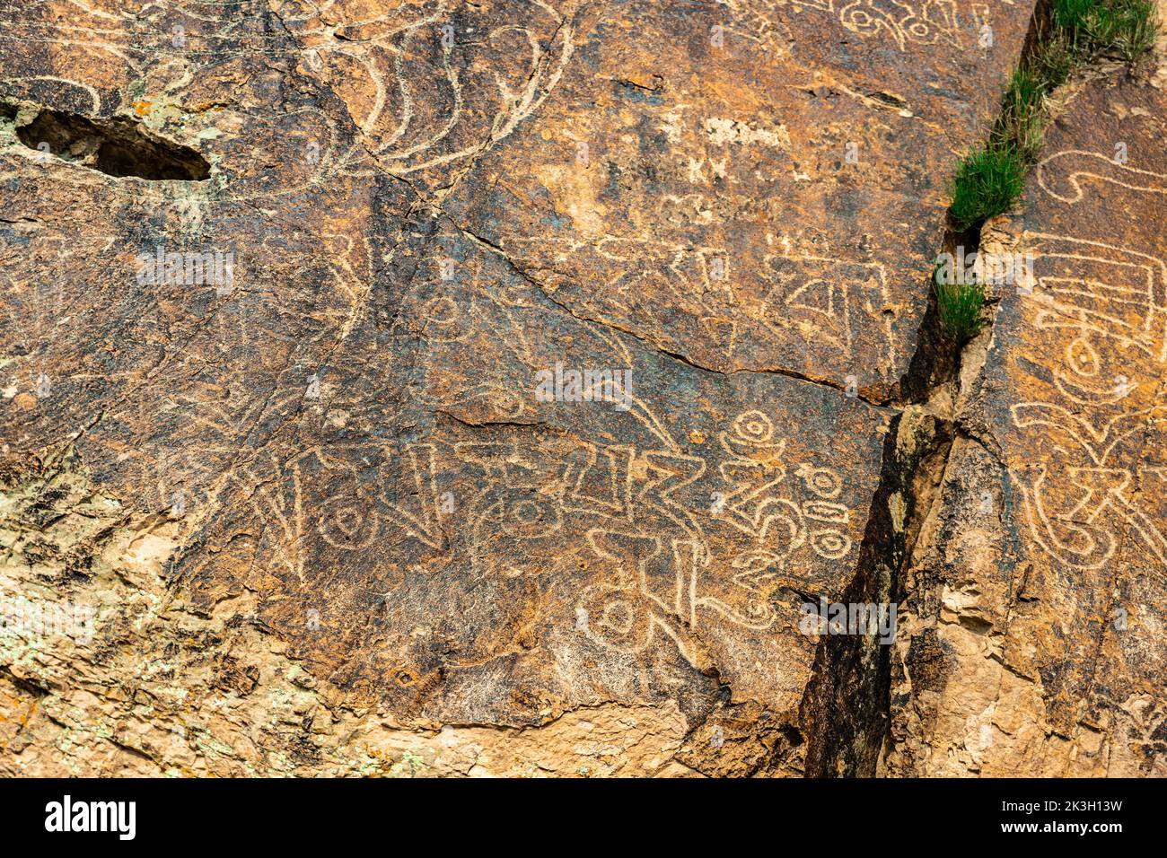 Ancient inscriptions on the rock in Sanskrit. open air buddhist temple ...