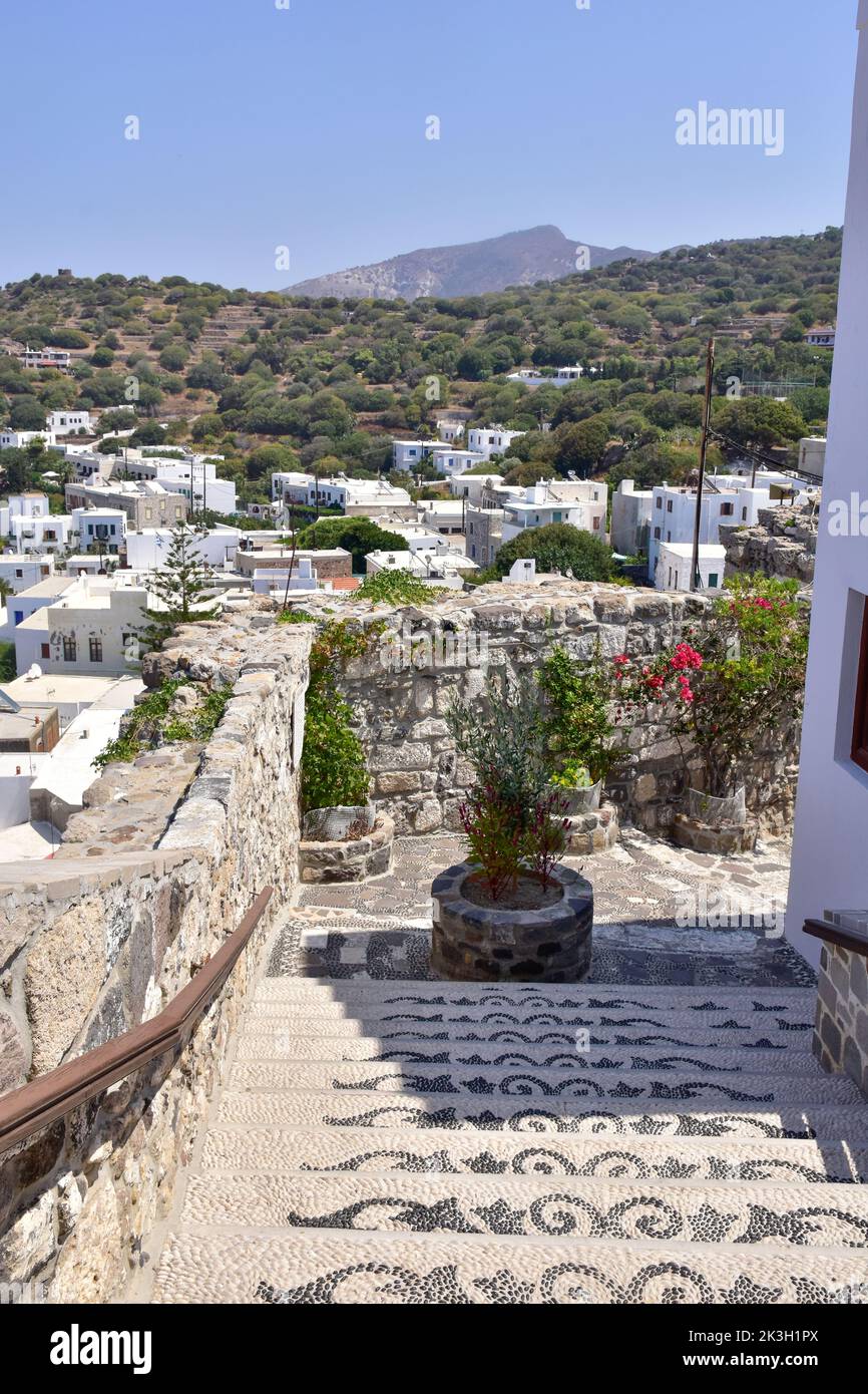 White houses with blue shutters, balconies, the traditional Greek ...