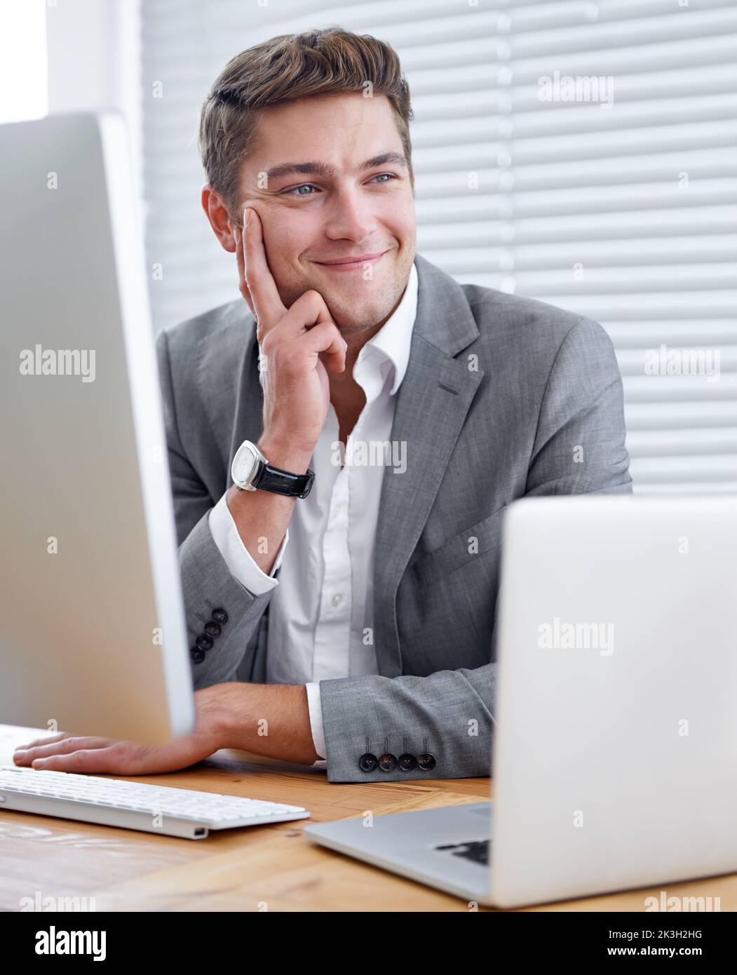 Good looking young man working hi-res stock photography and images - Alamy