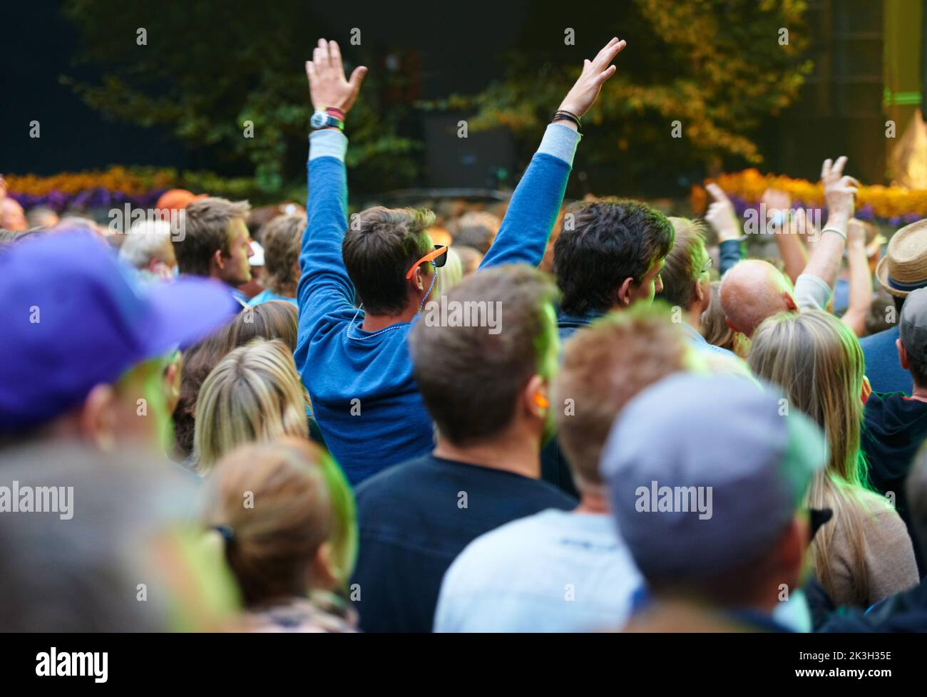 Many excited people enjoying concert hi-res stock photography and ...
