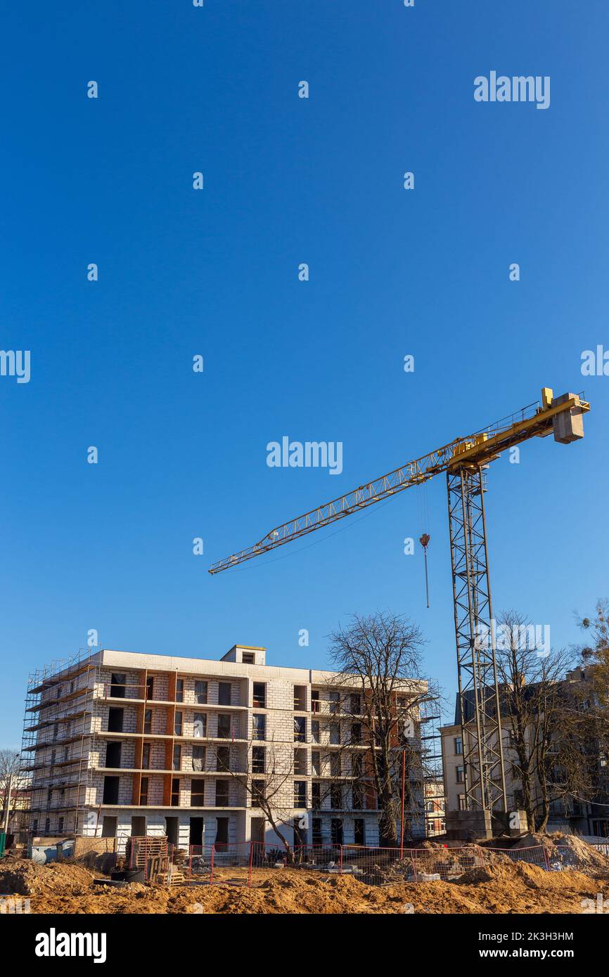 Insulation of the exterior walls of a building under construction. The ...