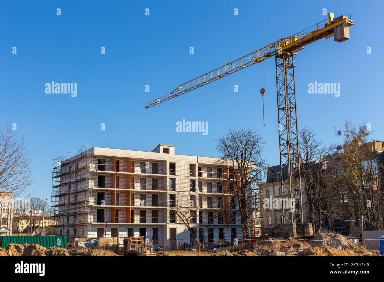 Insulation of the exterior walls of a building under construction. The ...