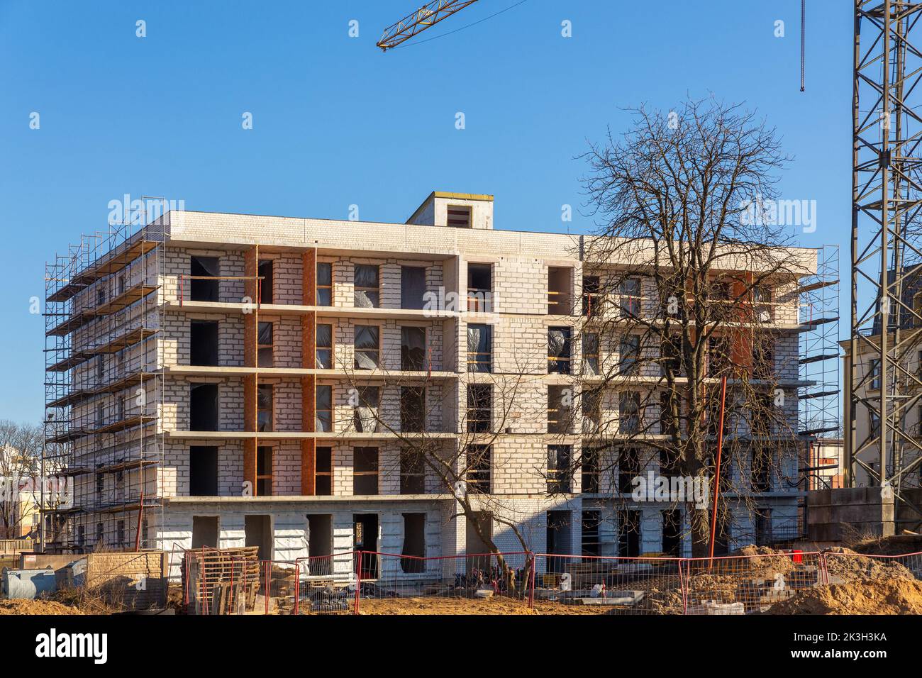 Insulation of the exterior walls of a building under construction. The ...