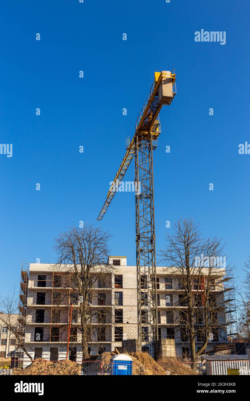 Insulation of the exterior walls of a building under construction. The ...