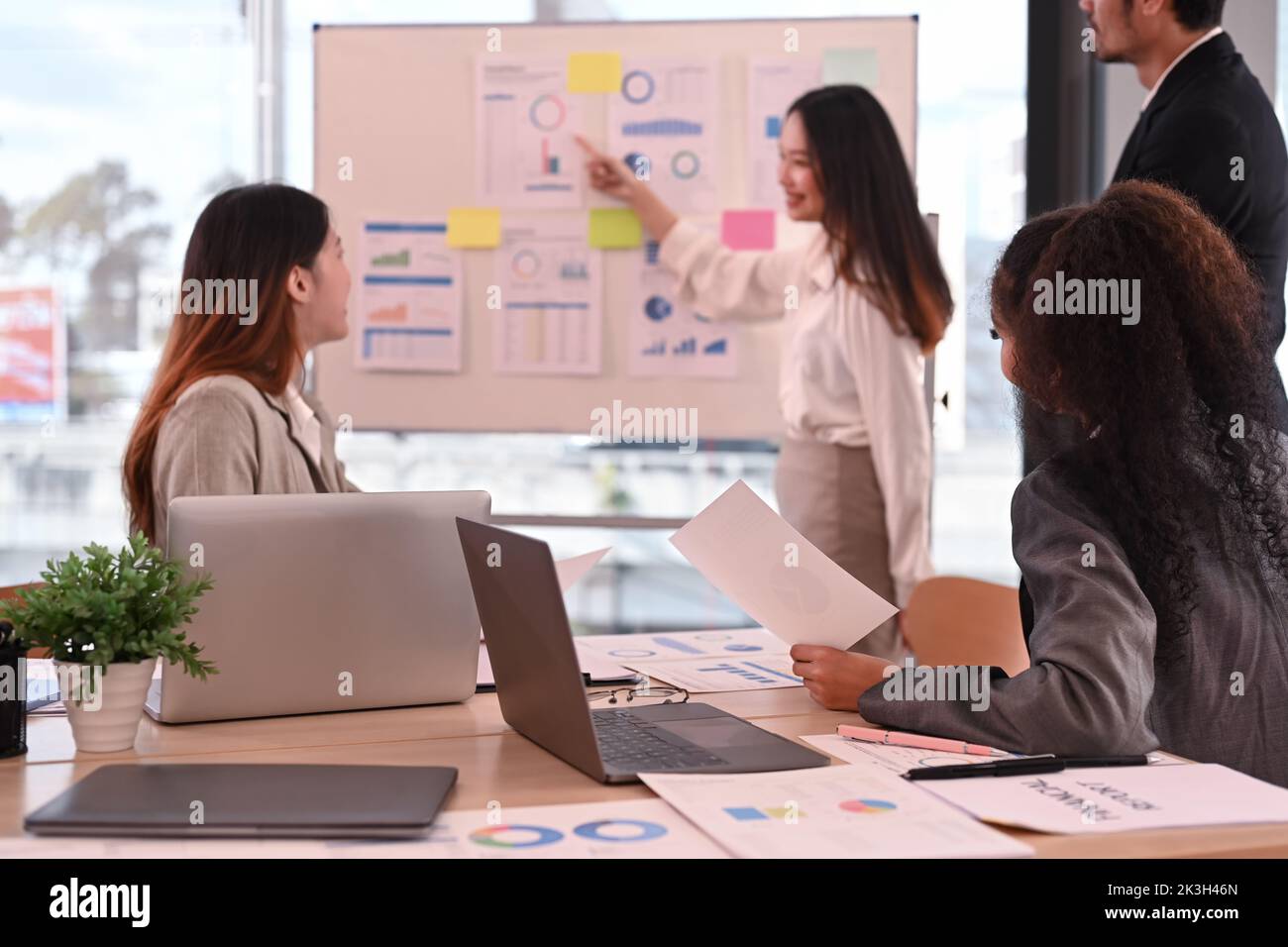 Group of young business people collaborating for new startup project in ...