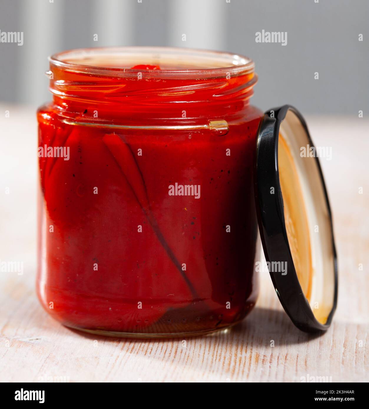 Canned red bell pepper in jar Stock Photo - Alamy