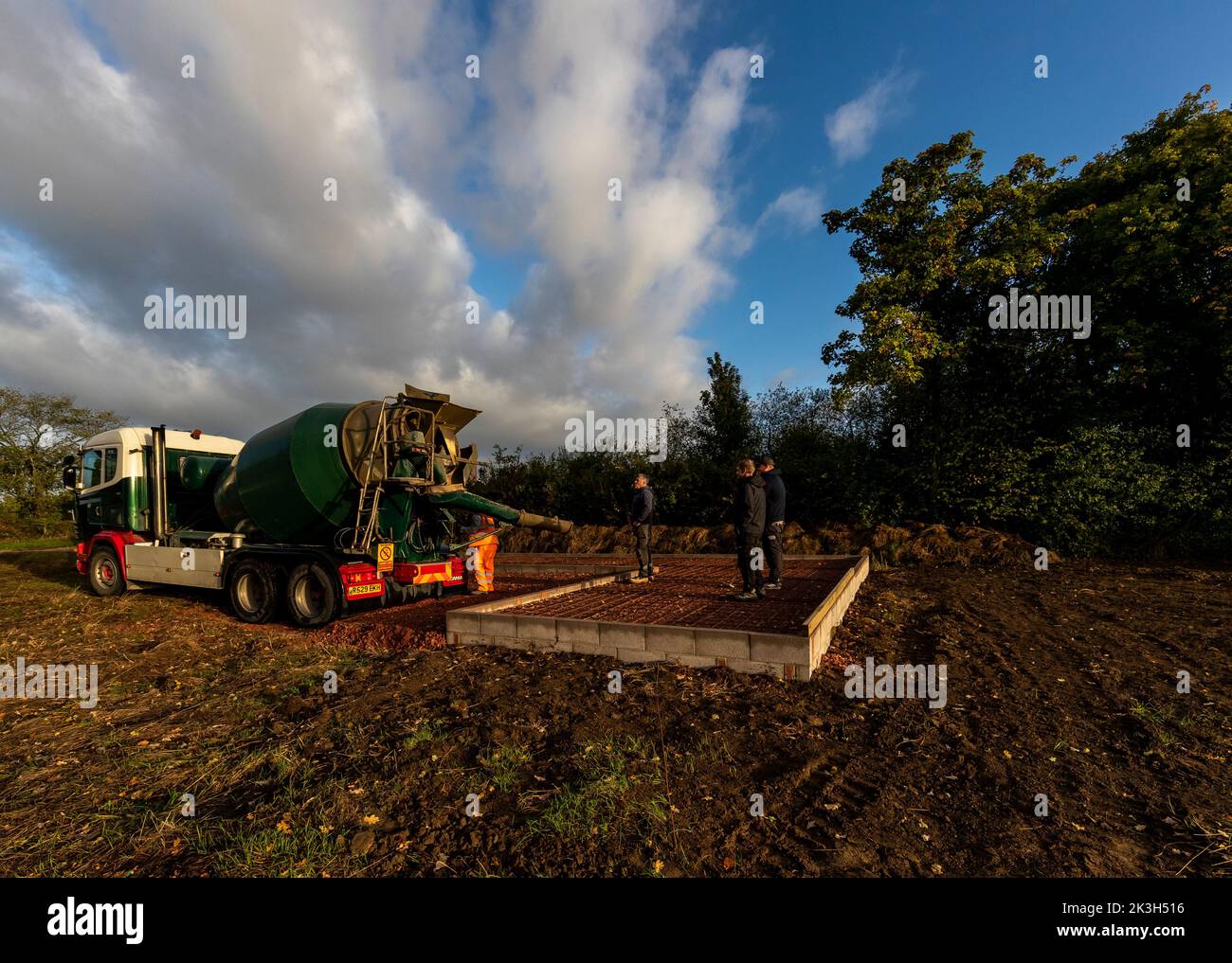 Early morning concrete pouring of a stable block slab. Seen as lacking ...