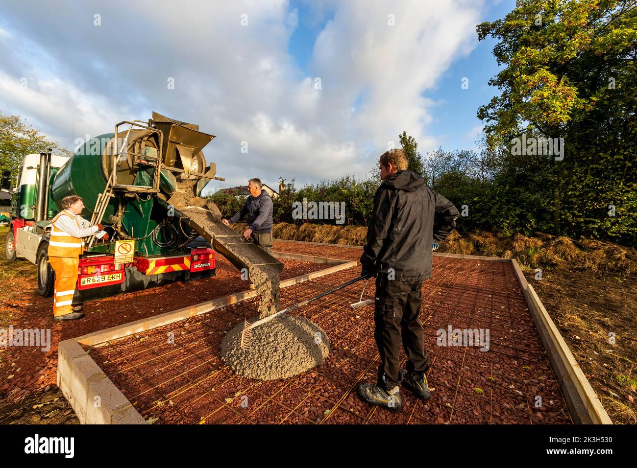 Early morning concrete pouring of a stable block slab. Seen as lacking ...