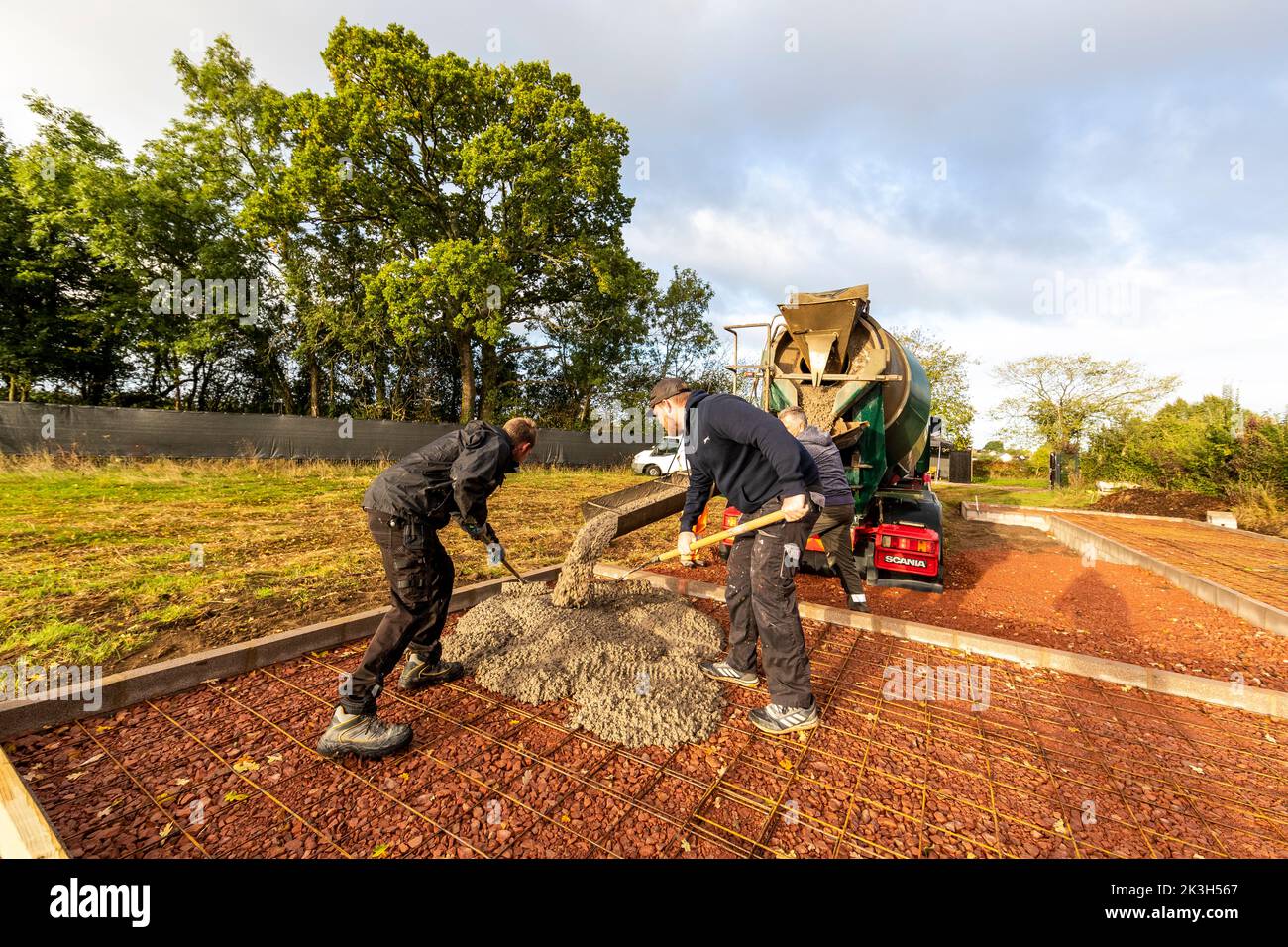 Early morning concrete pouring of a stable block slab. Seen as lacking ...