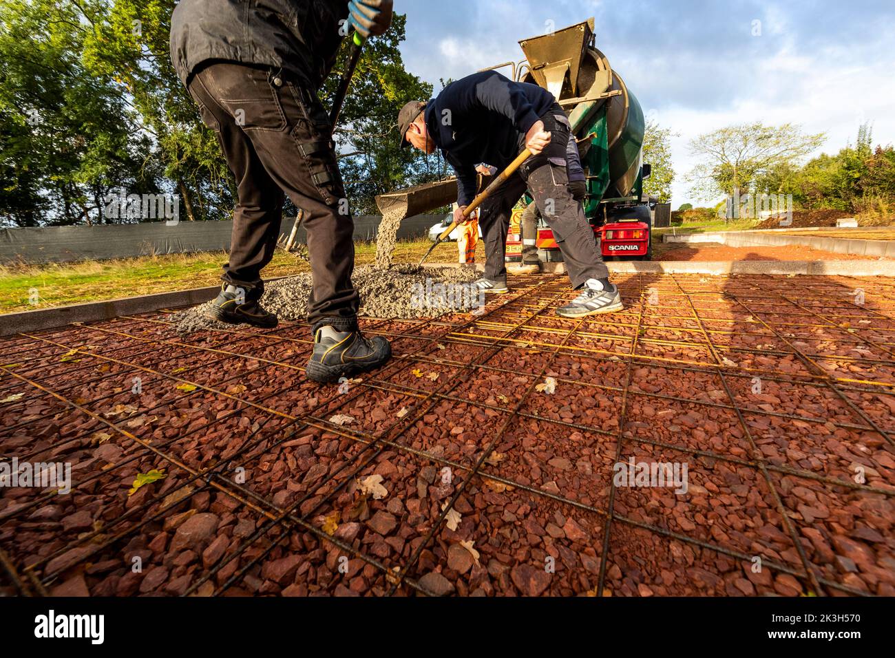 Early morning concrete pouring of a stable block slab. Seen as lacking ...