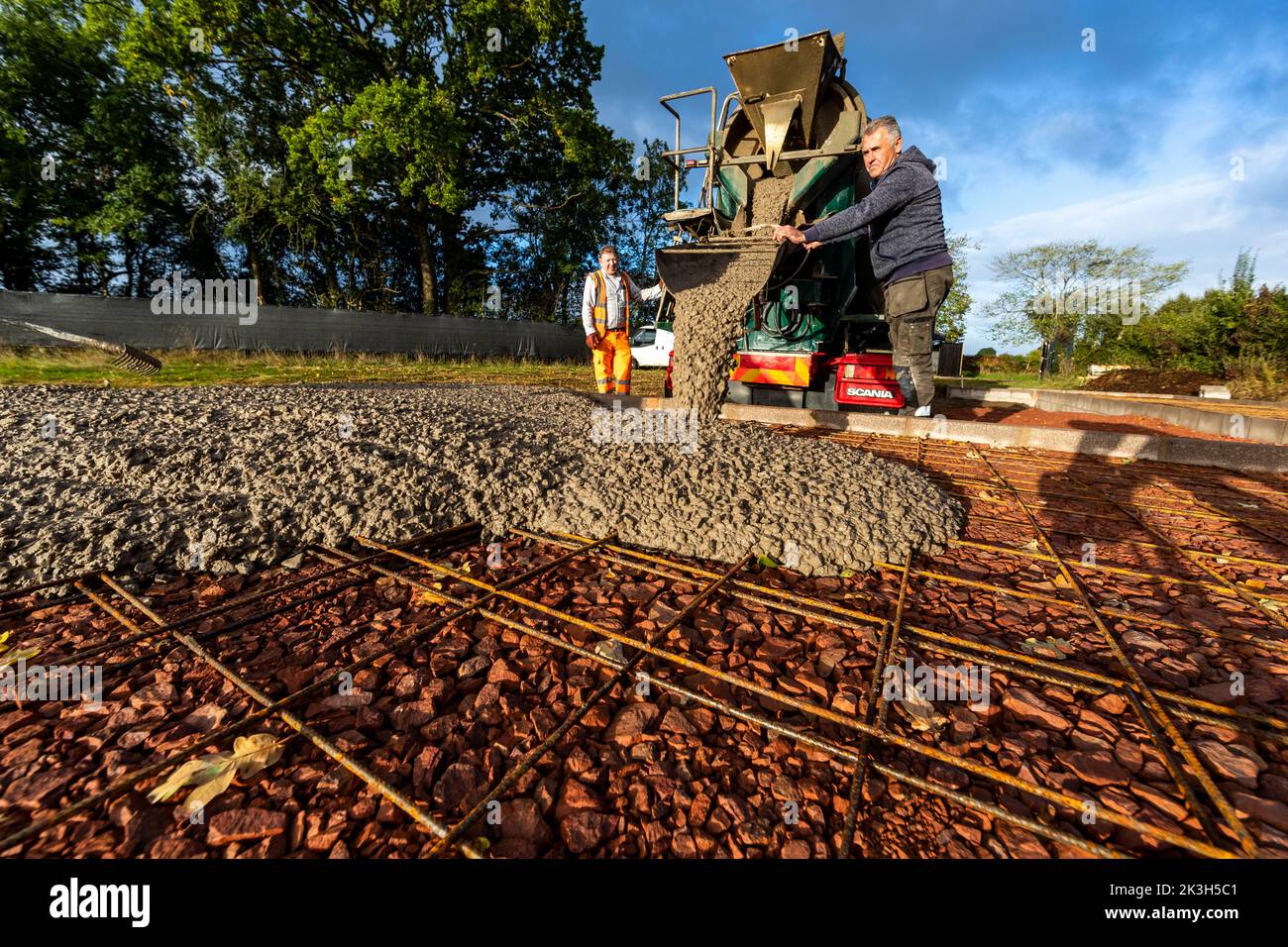 Early morning concrete pouring of a stable block slab. Seen as lacking ...