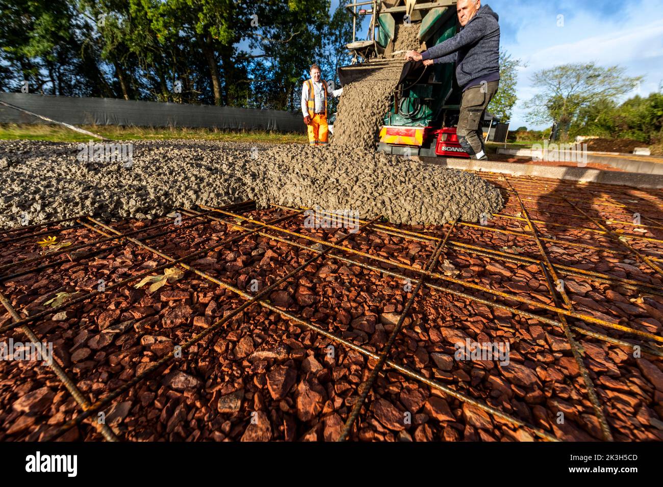 Early morning concrete pouring of a stable block slab. Seen as lacking ...