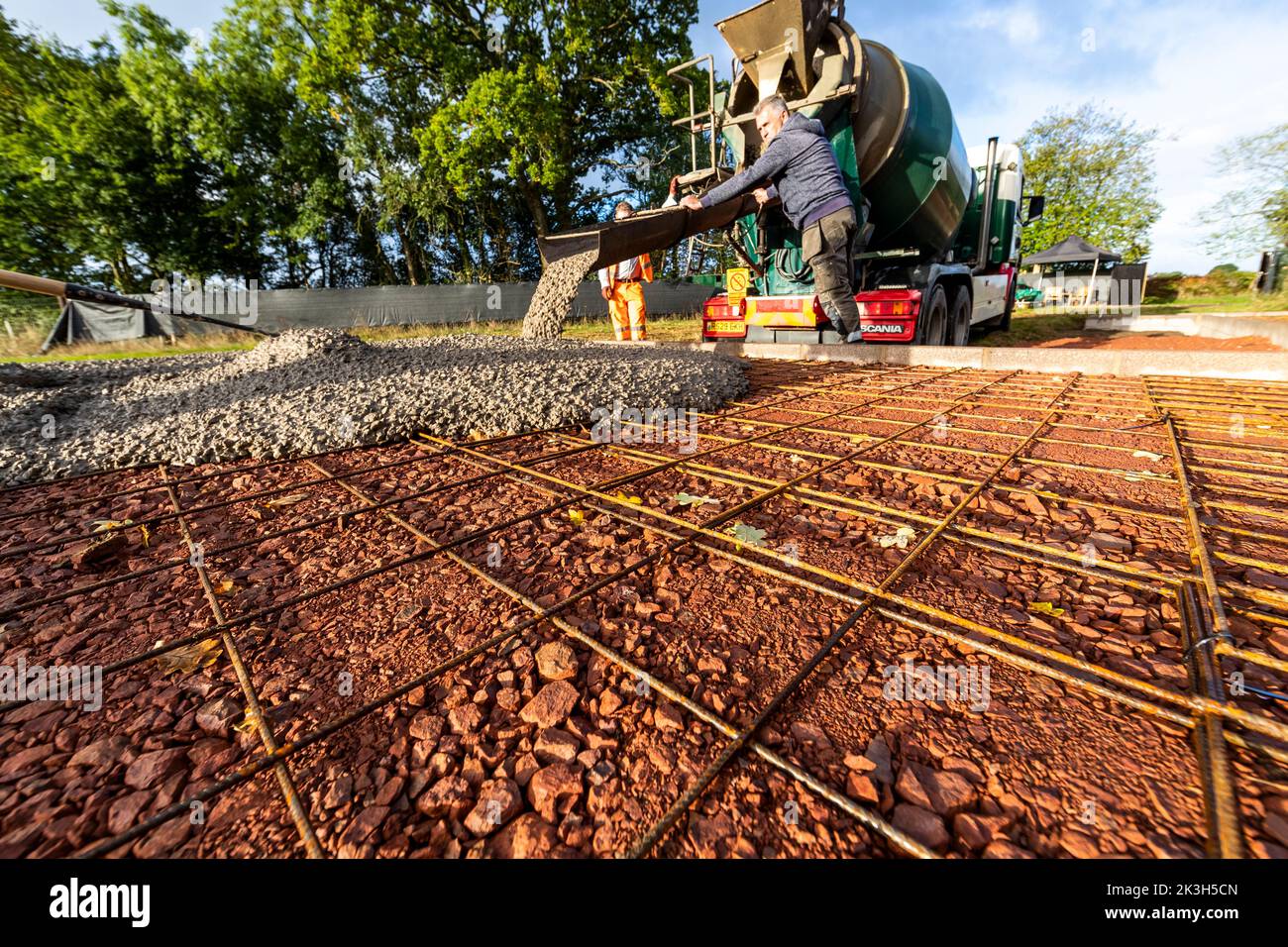 Early morning concrete pouring of a stable block slab. Seen as lacking ...