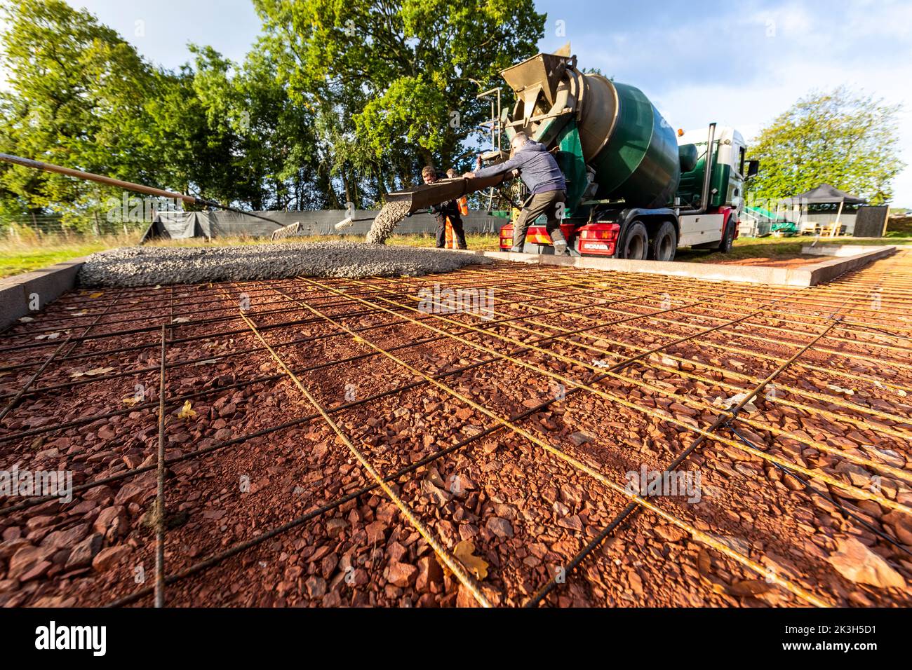 Early morning concrete pouring of a stable block slab. Seen as lacking ...