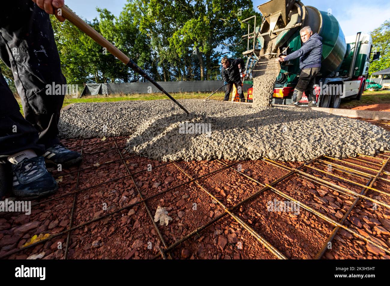 Early morning concrete pouring of a stable block slab. Seen as lacking ...