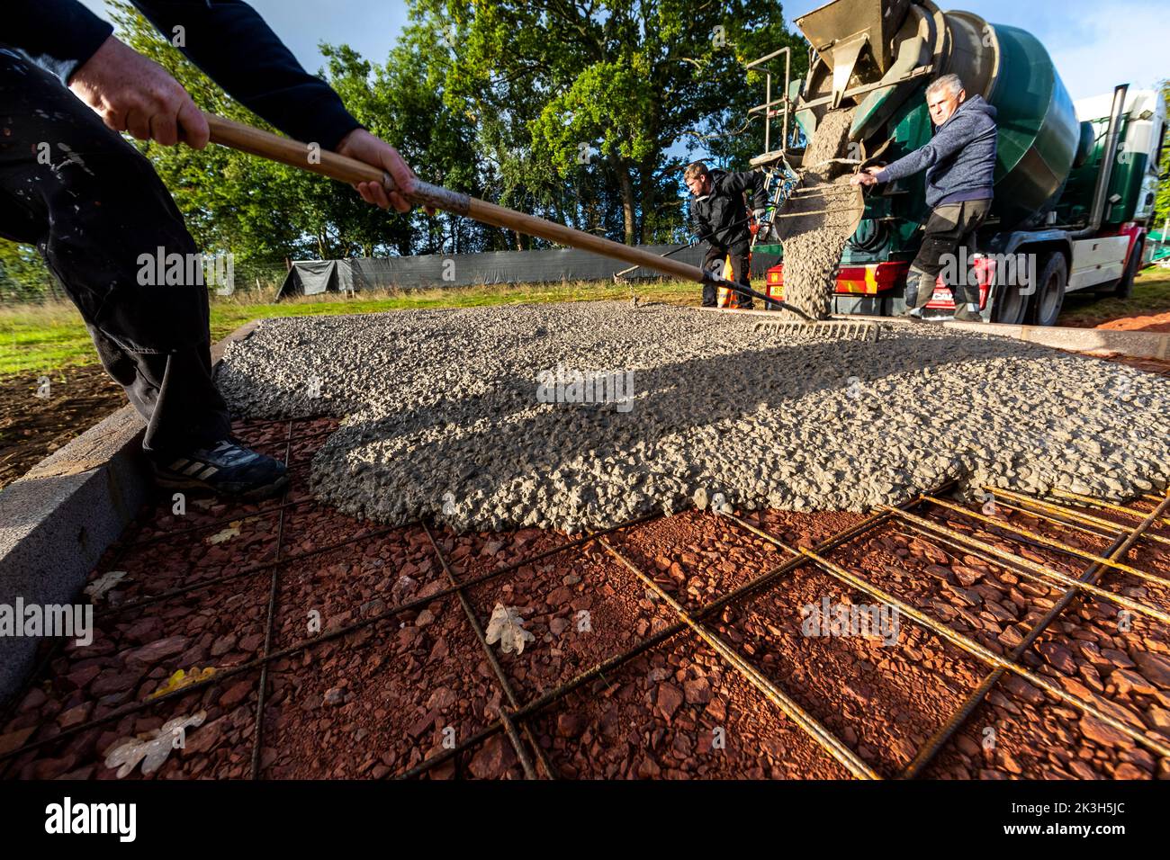 Early morning concrete pouring of a stable block slab. Seen as lacking ...