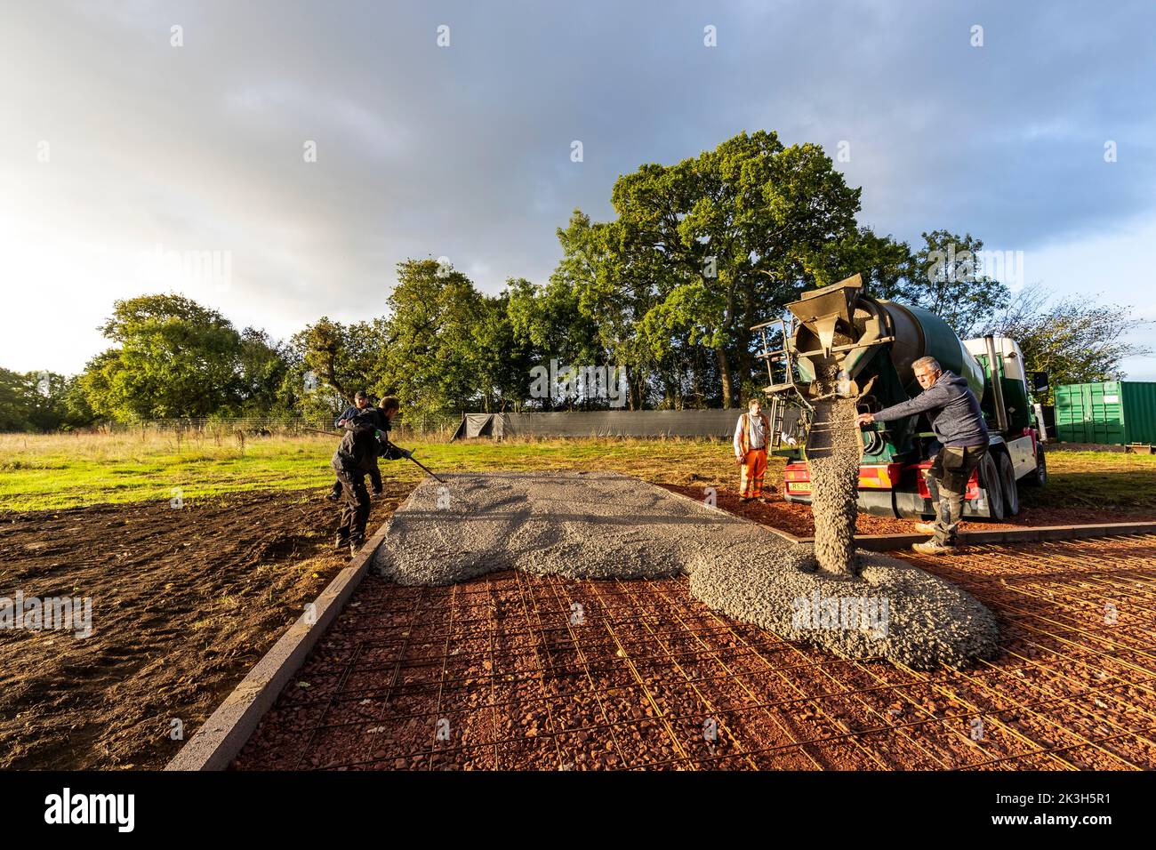 Early morning concrete pouring of a stable block slab. Seen as lacking ...