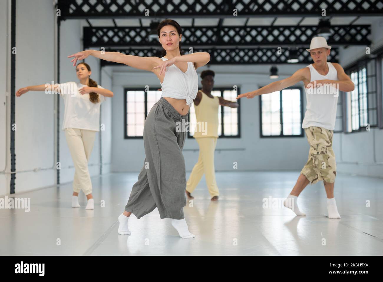 Asian woman studying movement of contemporary dance Stock Photo - Alamy