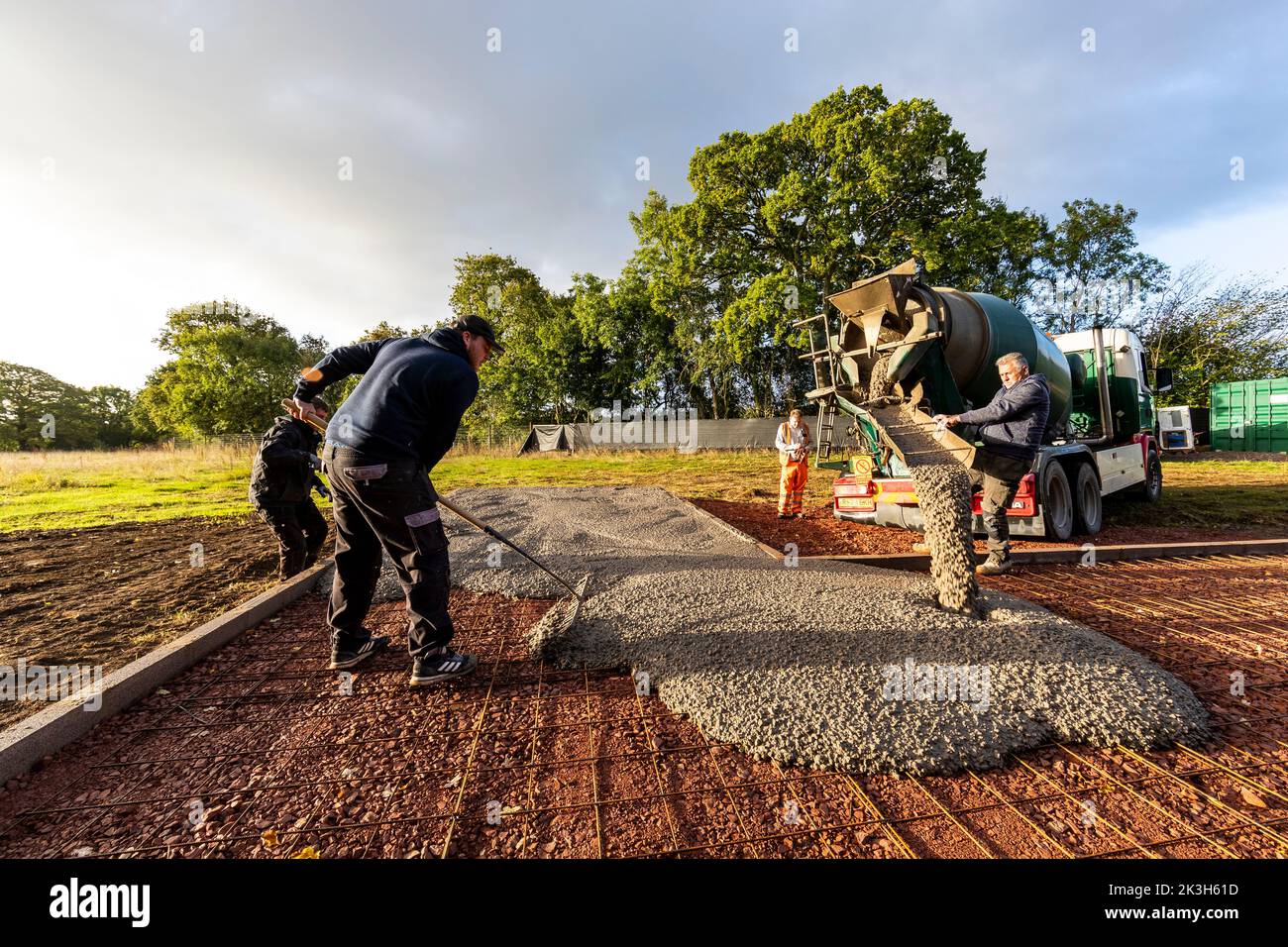Early morning concrete pouring of a stable block slab. Seen as lacking ...