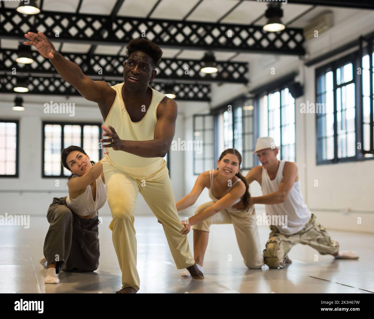 Group artists rehearsing spectacle scene Stock Photo - Alamy