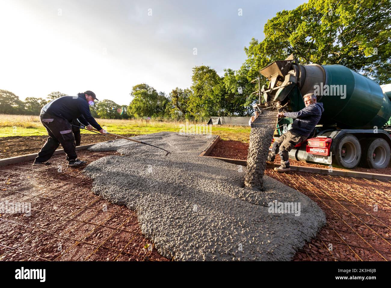 Early morning concrete pouring of a stable block slab. Seen as lacking ...