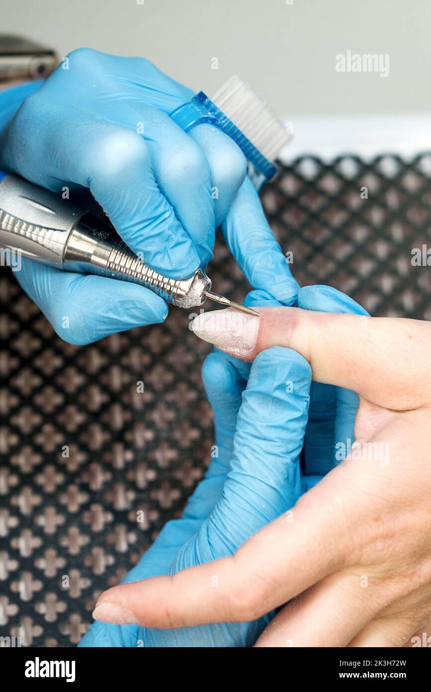 Woman removes nail polish from hi-res stock photography and images - Alamy