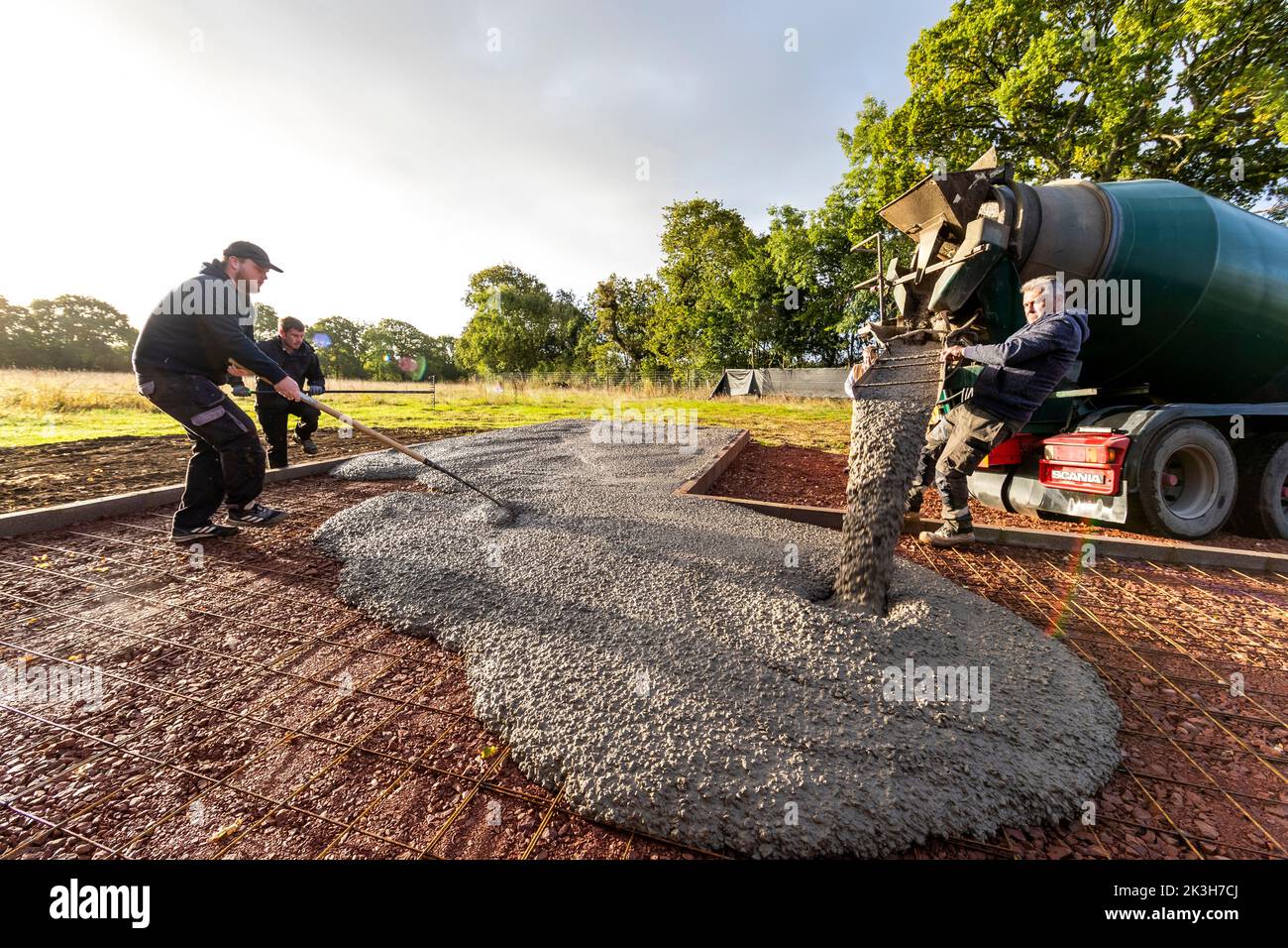 Early morning concrete pouring of a stable block slab. Seen as lacking ...
