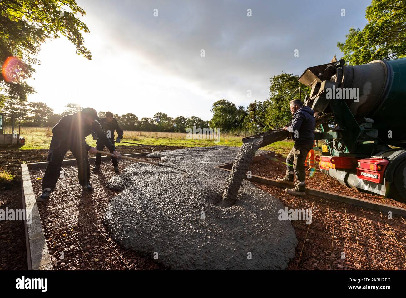 Early morning concrete pouring of a stable block slab. Seen as lacking ...