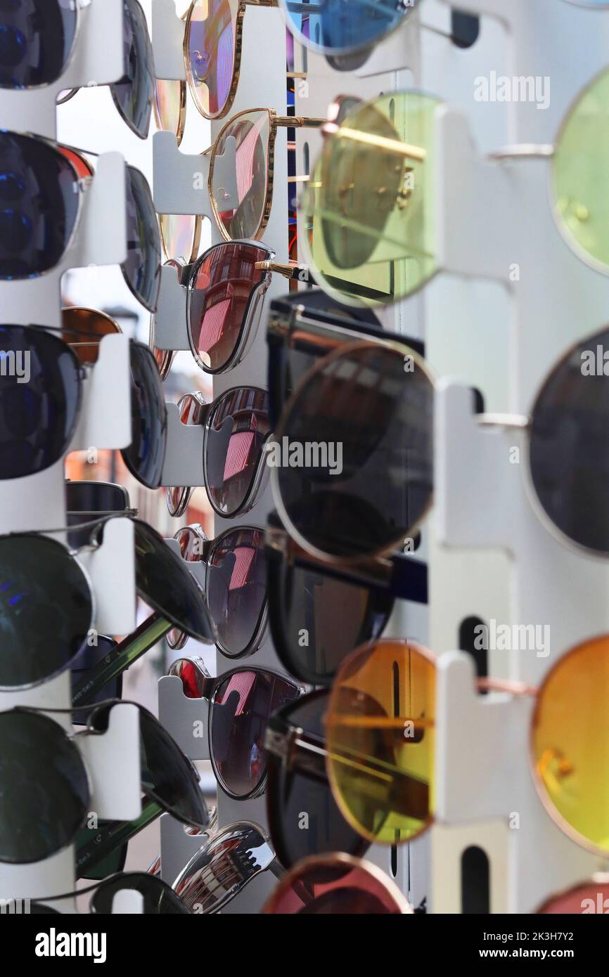 Lots of Sunglasses on the street stand in Heidelberg, Germany. Group of ...