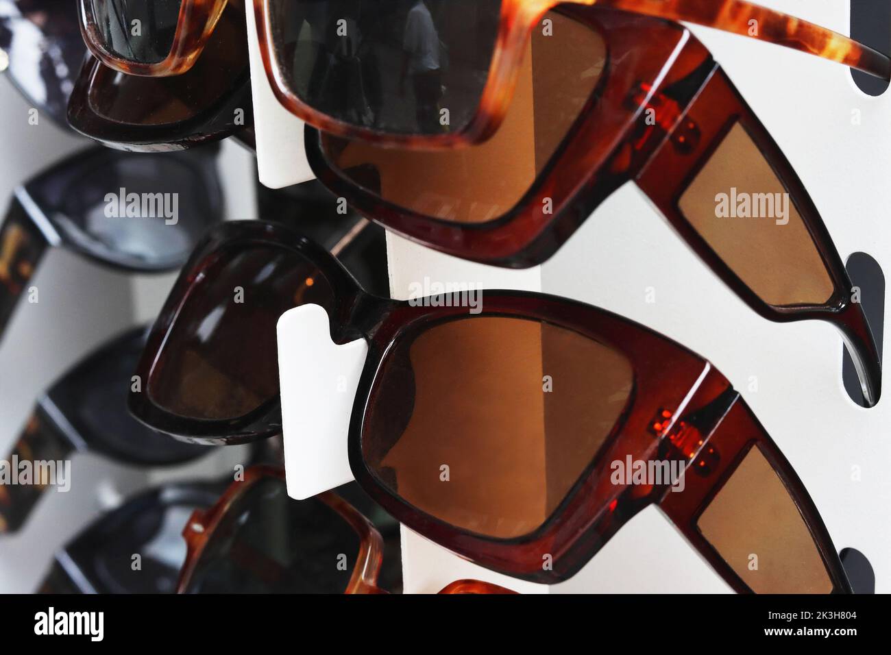 Lots of Sunglasses on the street stand in Heidelberg, Germany. Group of ...