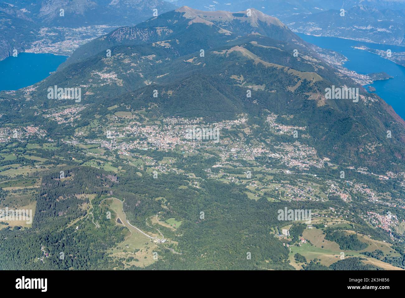 aerial shot, from a glider, of Intelvi valley with san Fedele and ... aerial shot, from a glider, of Intelvi valley with san Fedele and ...