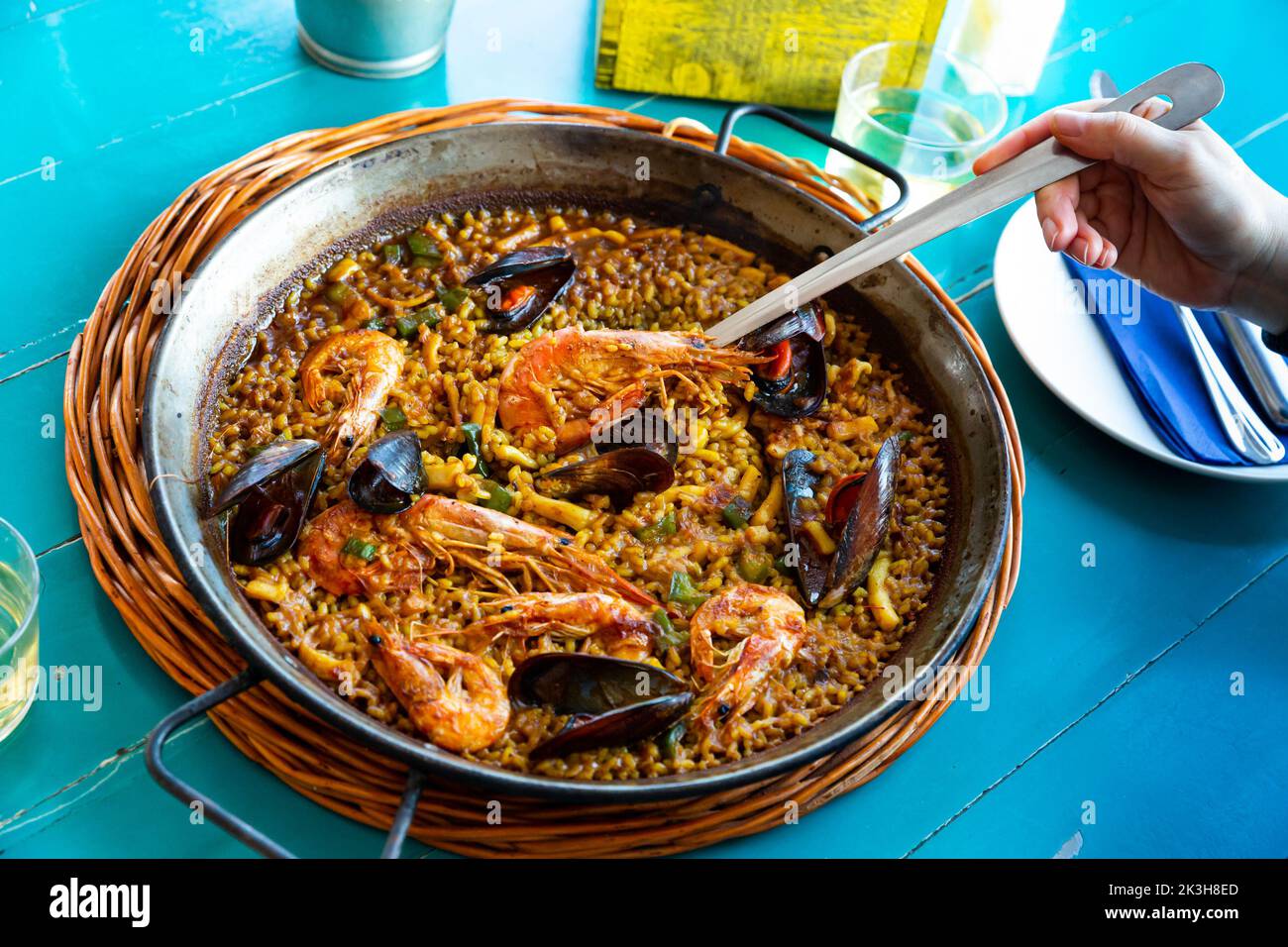 Spainsh dish seafood paella with rice, shrimps and mussels Stock Photo ...