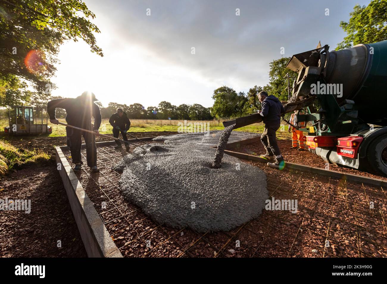 Early morning concrete pouring of a stable block slab. Seen as lacking ...