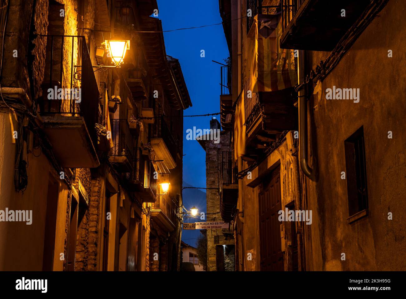 Streets of the medieval town of Bagà at blue hour and night (Berguedà ...