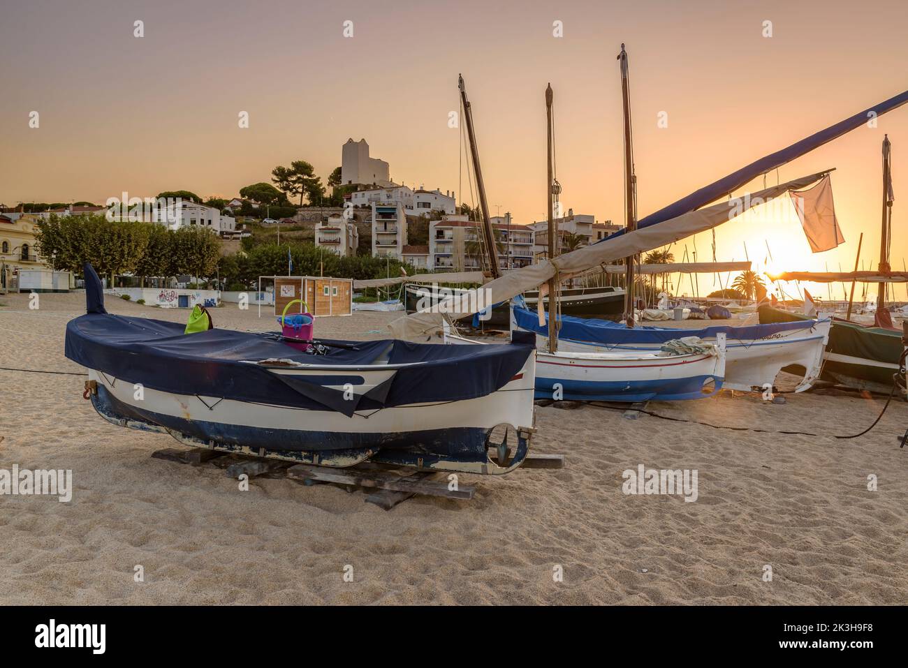 Sunrise in Sant Pol de Mar with boats on the beach (Maresme, Barcelona ...