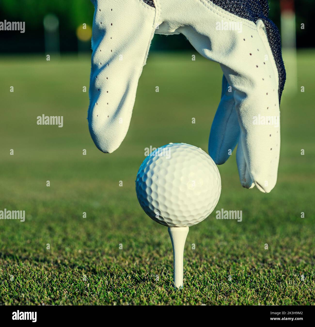 golf course background Golf balls on artificial grass with blur ...
