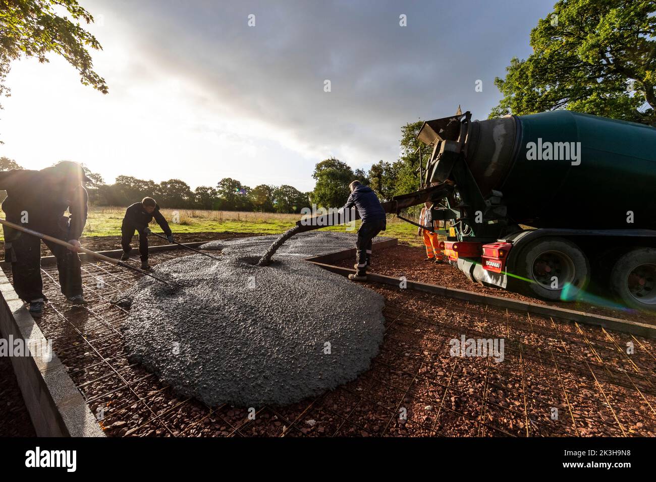 Early morning concrete pouring of a stable block slab. Seen as lacking ...