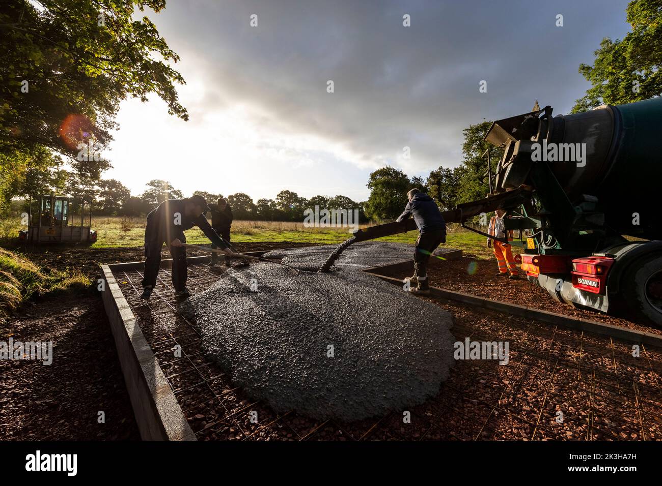 Early morning concrete pouring of a stable block slab. Seen as lacking ...