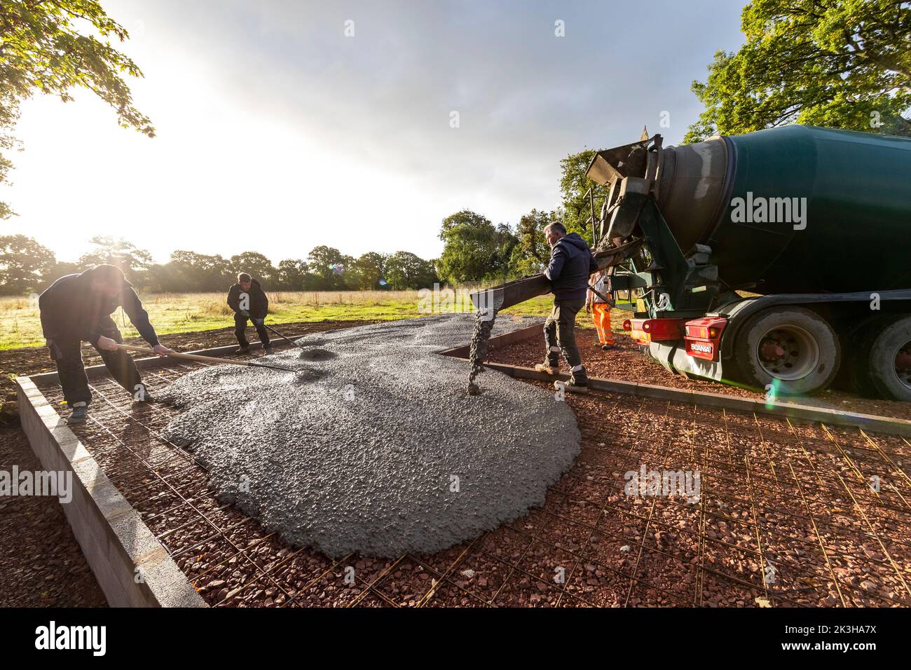 Early morning concrete pouring of a stable block slab. Seen as lacking ...