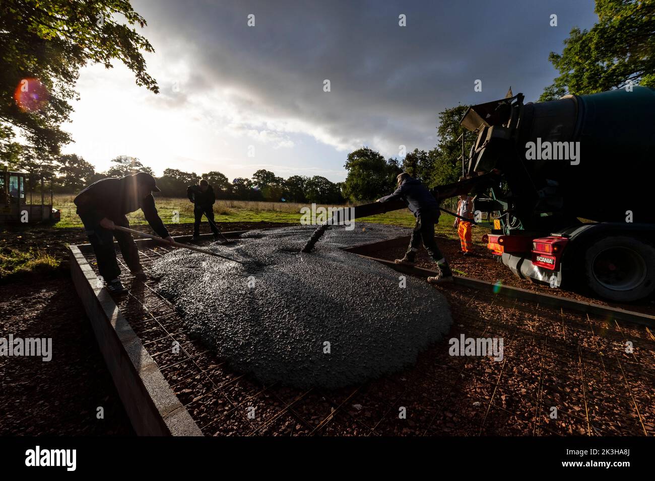 Early morning concrete pouring of a stable block slab. Seen as lacking ...