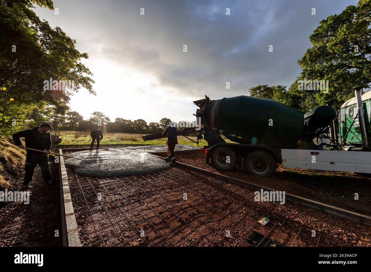 Early morning concrete pouring of a stable block slab. Seen as lacking ...