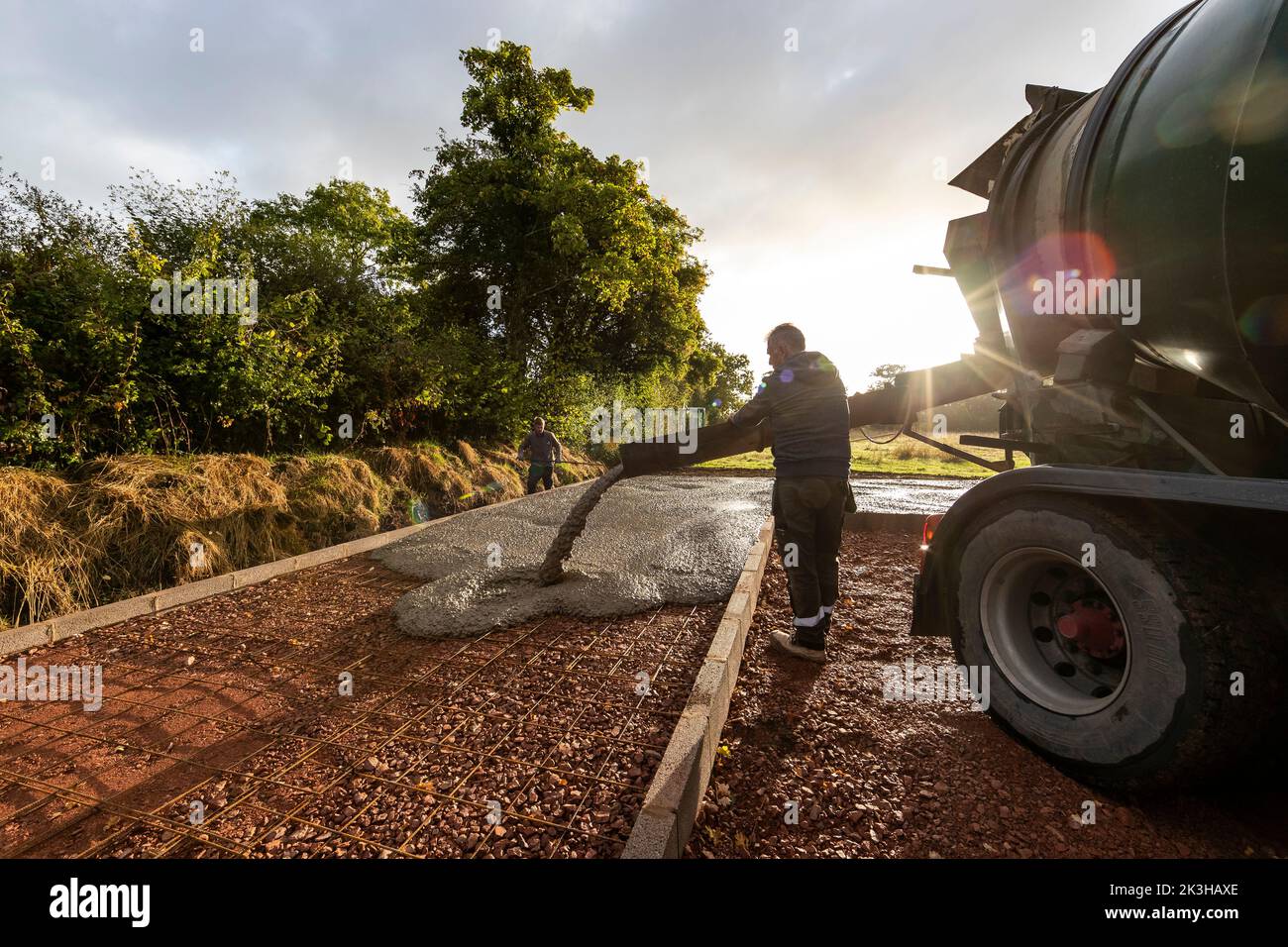 Early morning concrete pouring of a stable block slab. Seen as lacking ...