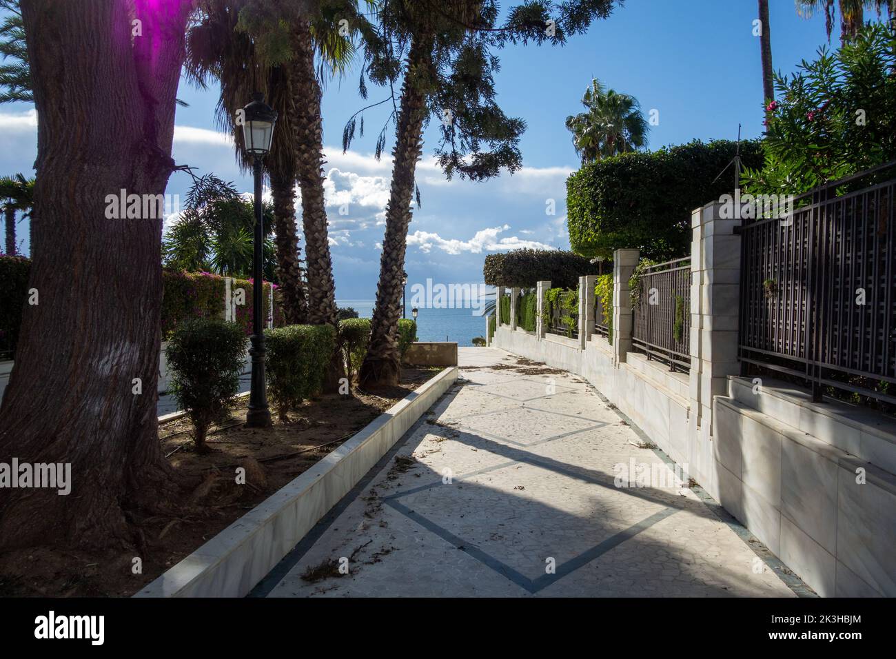 MARBELLA, ANDALUSIA, SPAIN - NOVEMBER 6, 2021 path and park entrance at ...