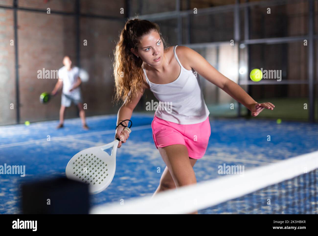 Padel tennis woman in court ready for play Stock Photo - Alamy