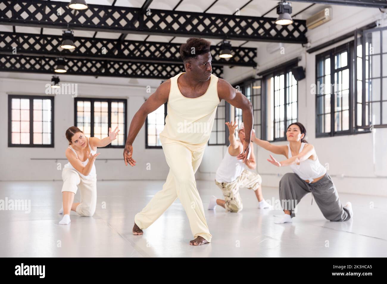 Young people dancing relaxation group choreography Stock Photo - Alamy