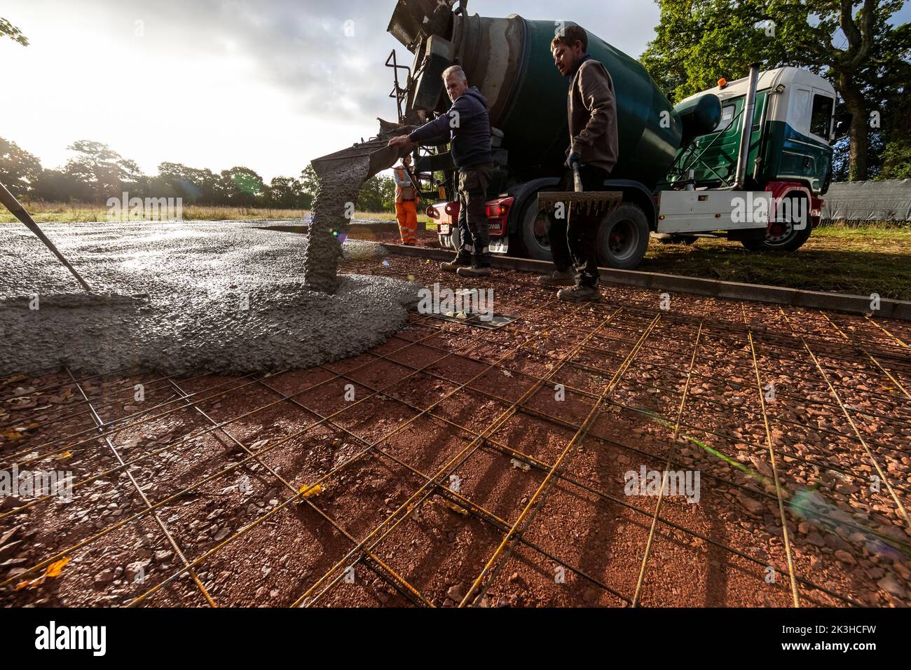 Early morning concrete pouring of a stable block slab. Seen as lacking ...